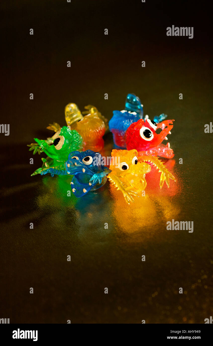 Rubber coloured monsters in group Stock Photo - Alamy