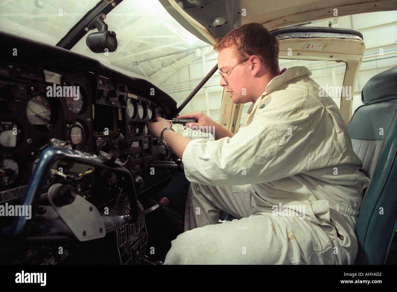 British Airways aircraft maintenance trainees working on a Piper Aztec ...