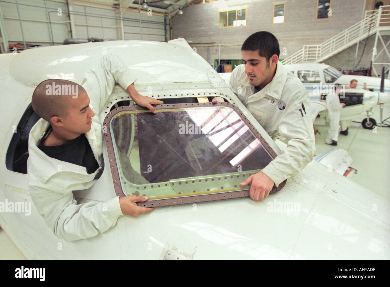 British Airways aircraft maintenance trainees working on a Hawker ...