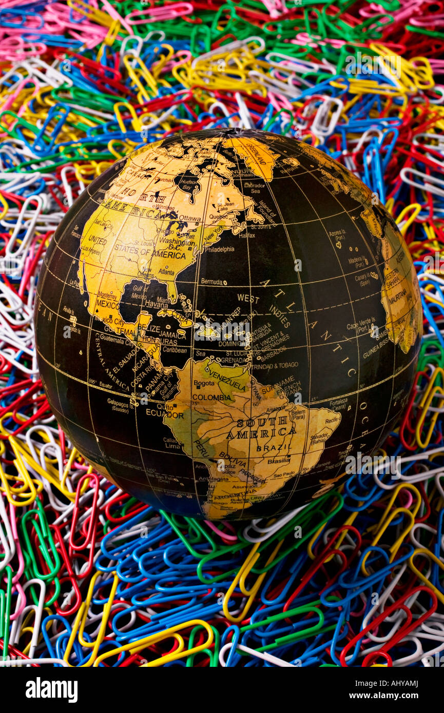 Black globe on paperclips Stock Photo - Alamy