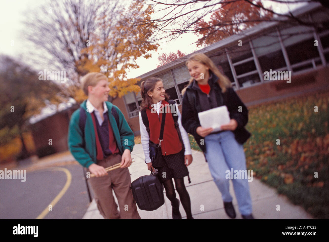 Caucasian middle school students walking home from middle school Stock ...