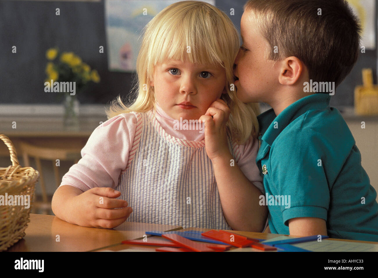 Children Sharing the secret photographed in a preschool classroom in ...