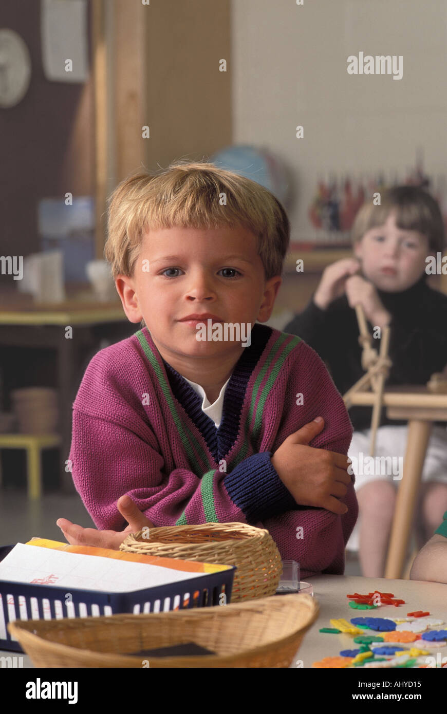 Portrait of a young child photographed in a preschool classroom in ...