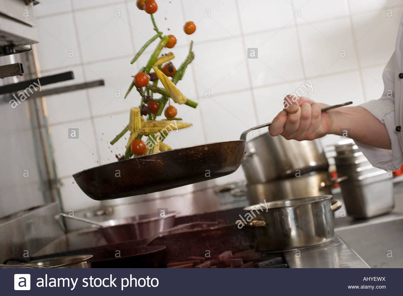 Chef Tossing Stock Photos & Chef Tossing Stock Images - Alamy