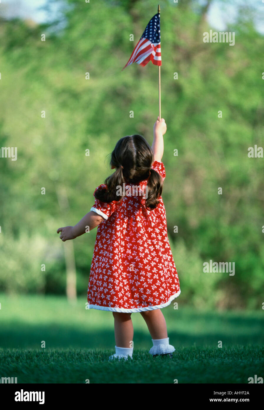 Little Girl Waving American Flag