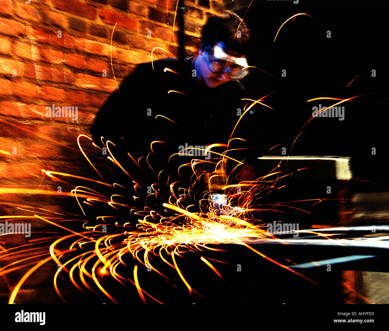 Welder working on transport building Stock Photo - Alamy