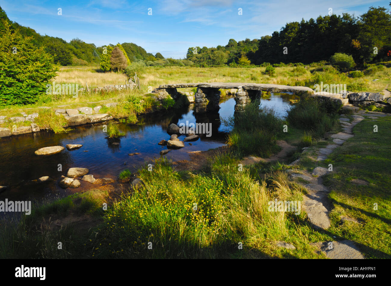 The ancient clapper bridge over the East Dart River at Postbridge on ...