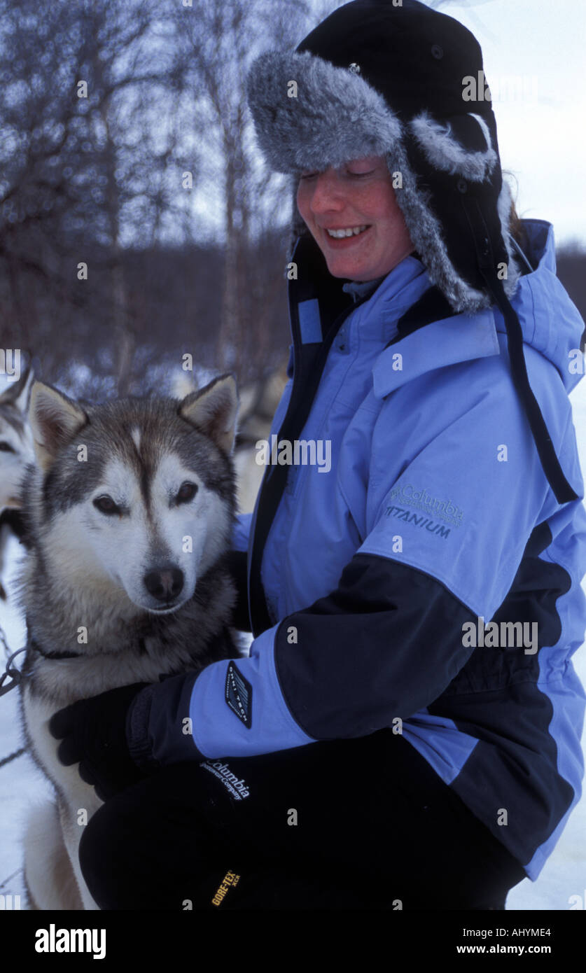 Musher with husky dog Lappland Northern Sweden Musher with husky dog ...