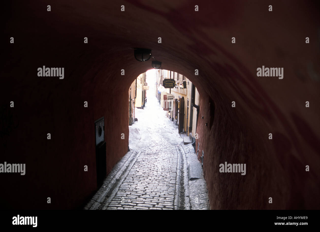 Restaurants and bars in a narrow alley in Gamla Stan Old Town Stockholm ...