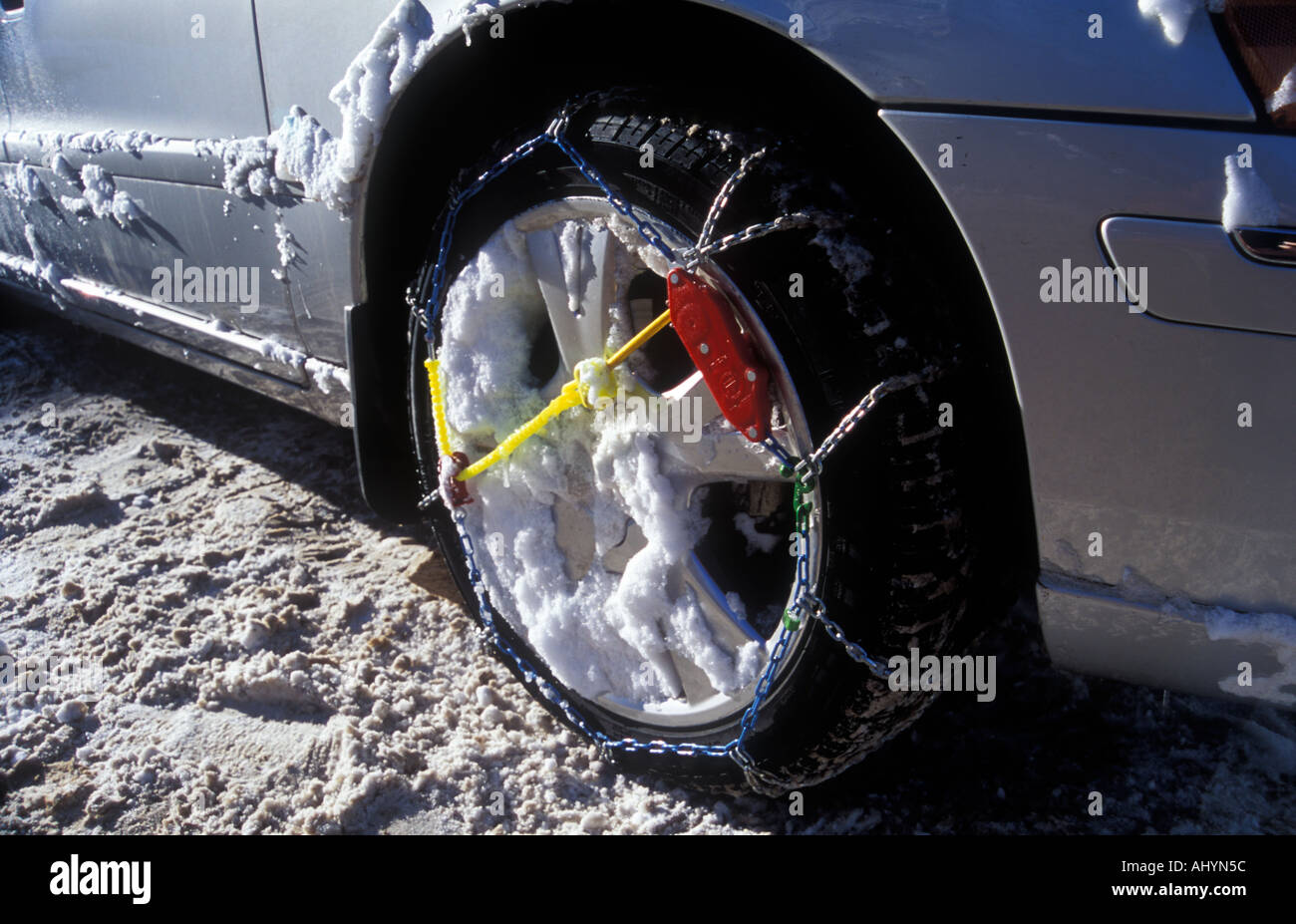 Car with snow chains fitted Courchevel 1850 French Alps Stock Photo - Alamy