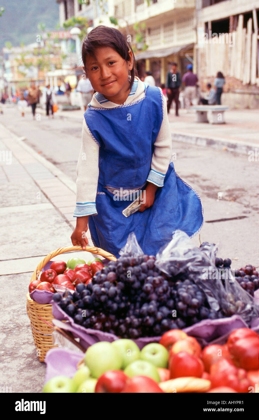 Street Vender Young girl 7 8 years old displaying fresh local fruits ...