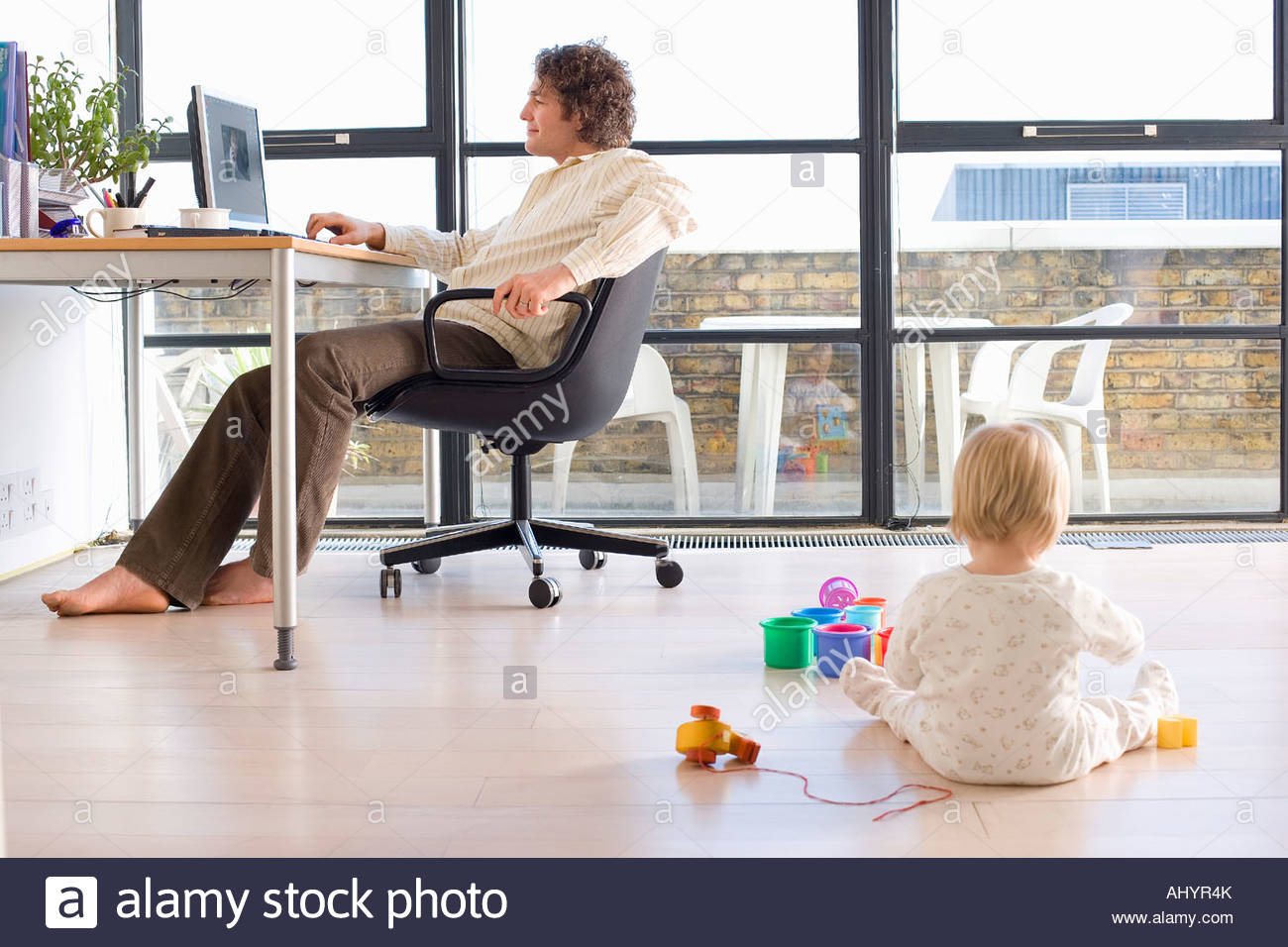 Baby Playing On Computer Stock Photos & Baby Playing On Computer Stock ...