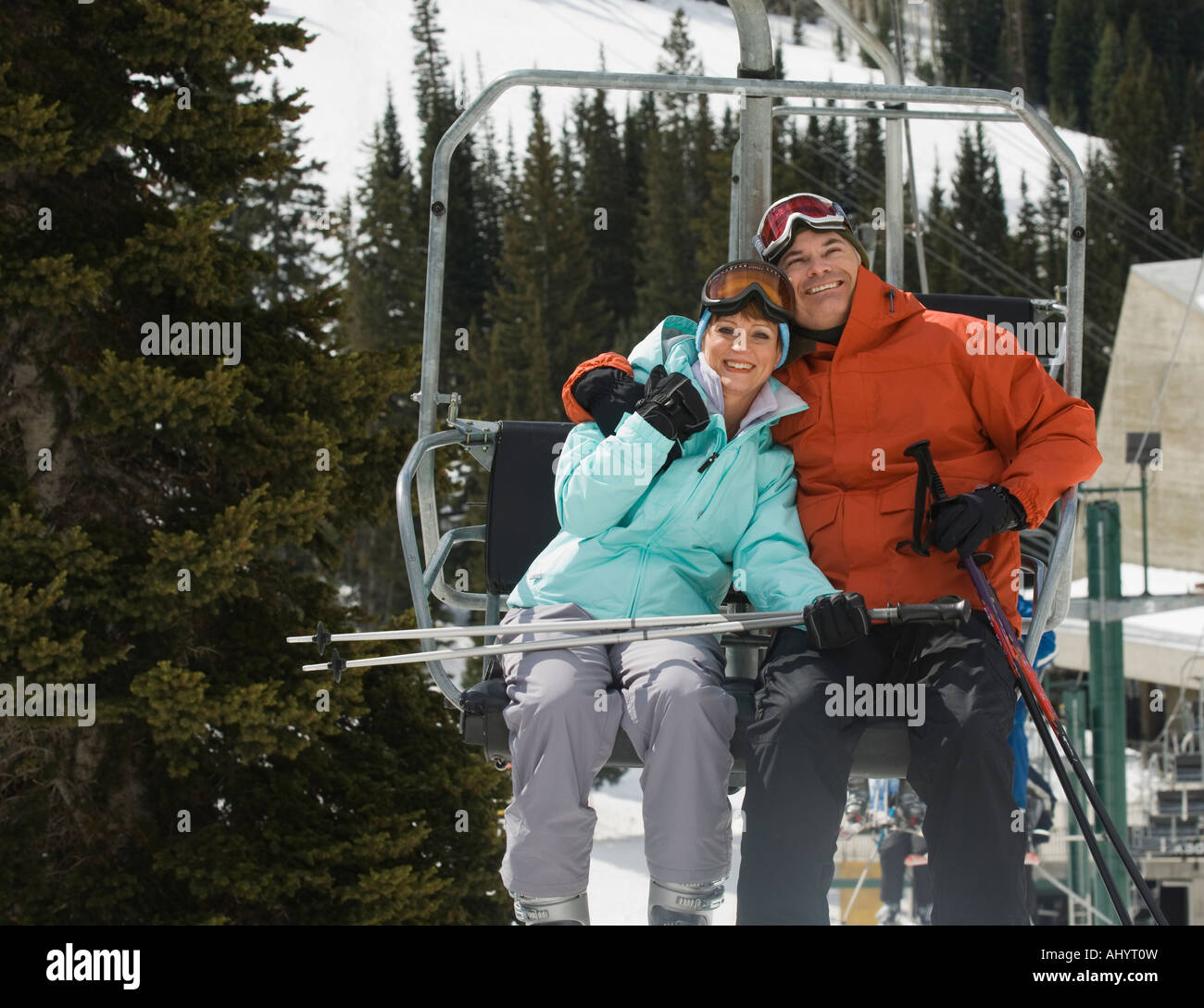 Couple on ski lift Stock Photo - Alamy