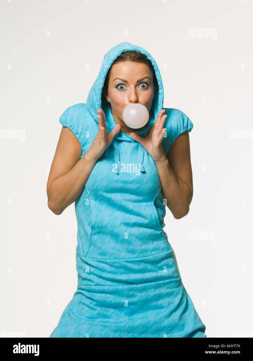 Woman blowing bubble with gum Stock Photo - Alamy