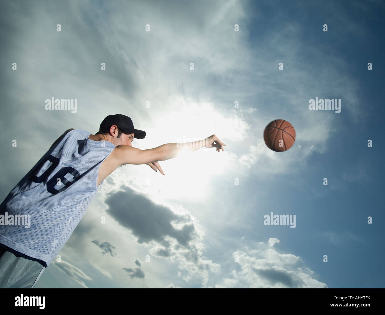 Three boys playing basketball outside hi-res stock photography and ...