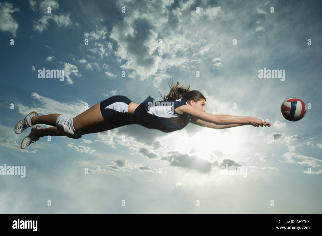 Low angle view of volleyball player jumping Stock Photo - Alamy
