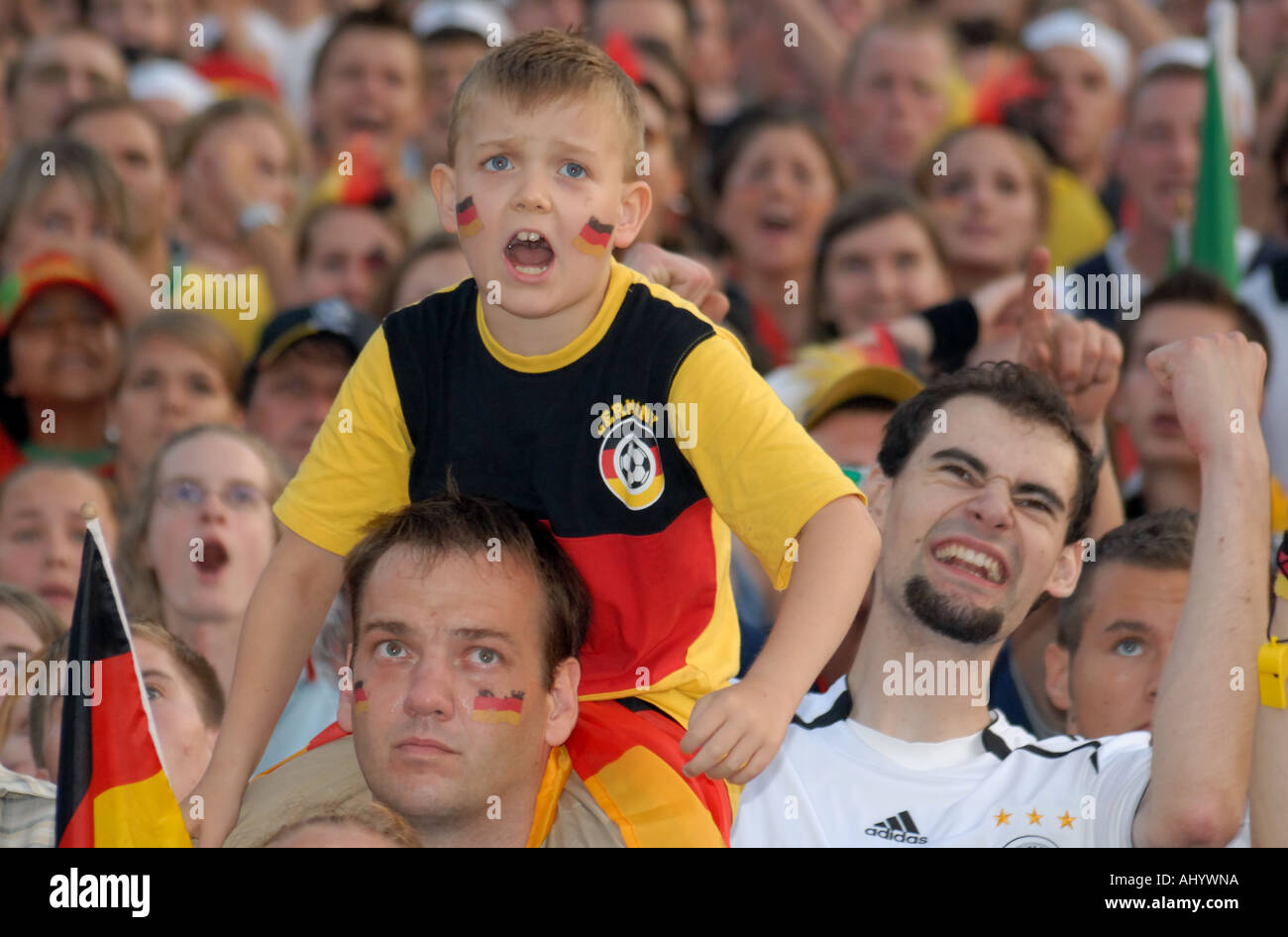 Boy face paint german football shirt hi-res stock photography and ...