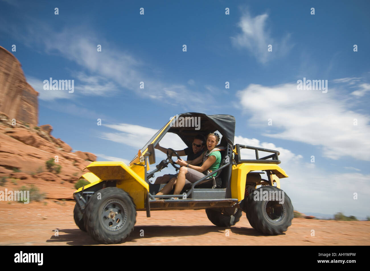 Woman driving off-road vehicle in desert Stock Photo - Alamy