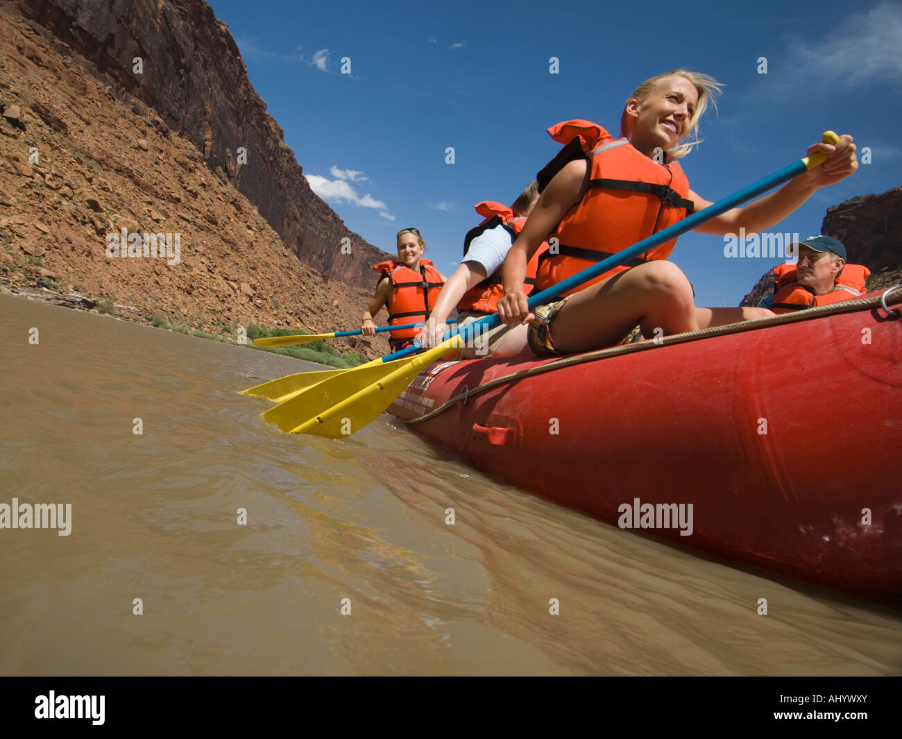 People paddling in raft Stock Photo - Alamy