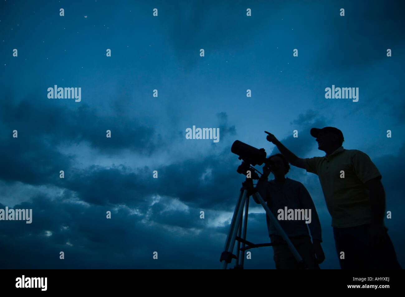 Person using telescope at night hi-res stock photography and images - Alamy