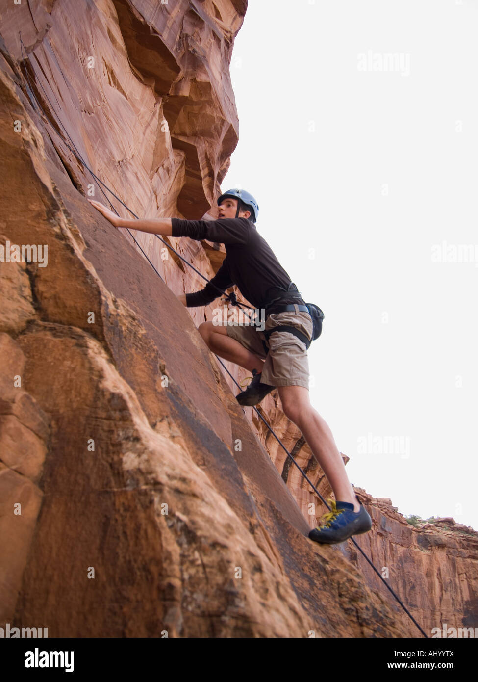 Man rock climbing Stock Photo - Alamy