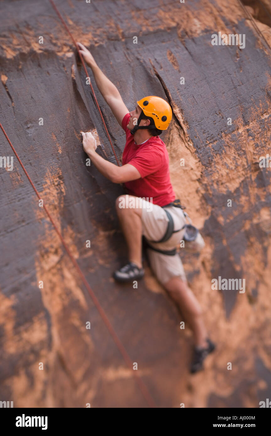 Man rock climbing Stock Photo - Alamy