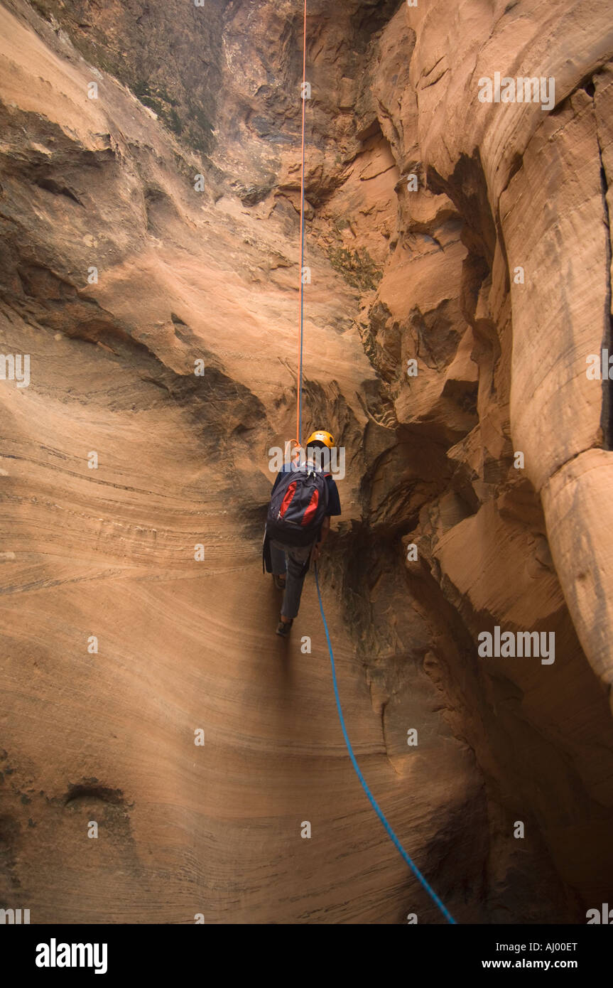 Person canyon rappelling Stock Photo - Alamy