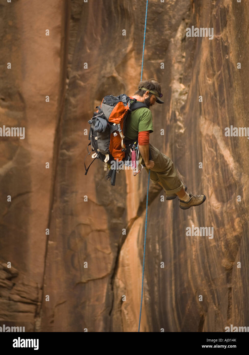 Man rappelling rock formation adventure hi-res stock photography and ...