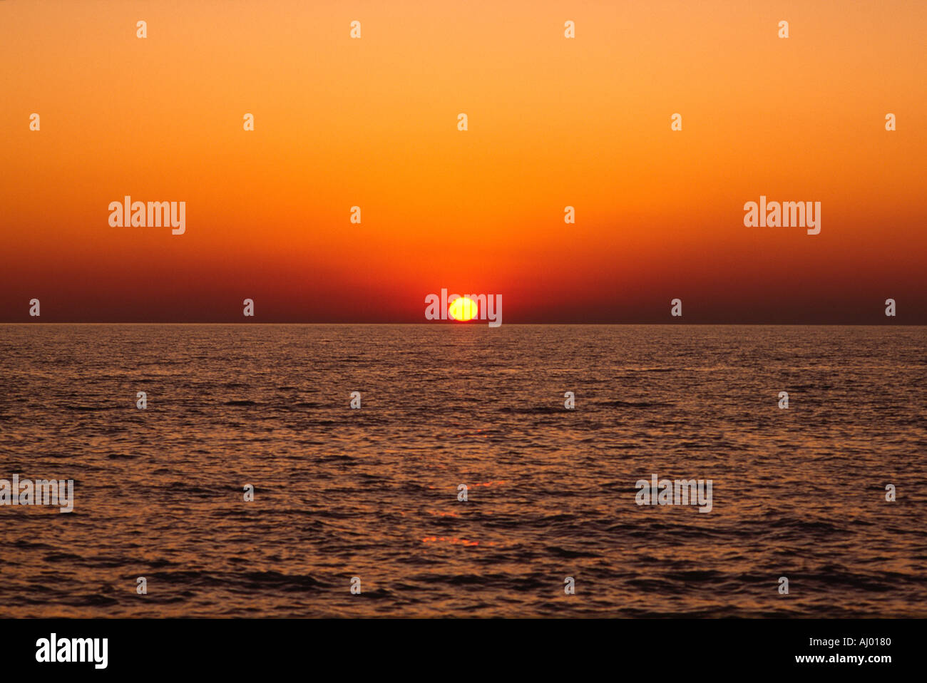 Evening sunset over ocean hi-res stock photography and images - Alamy