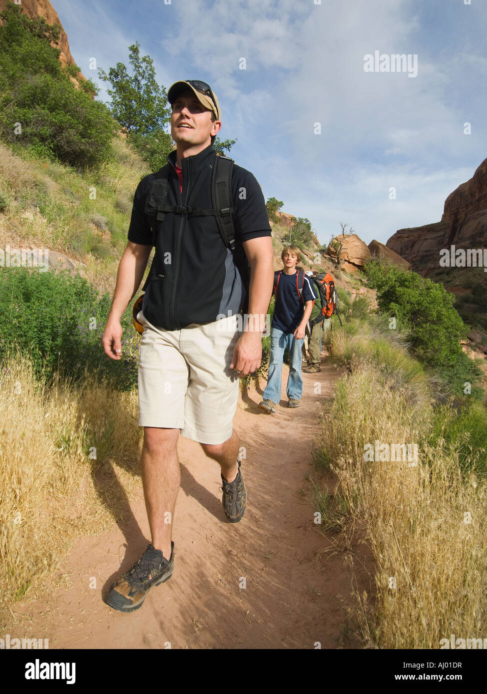 People hiking in desert Stock Photo - Alamy