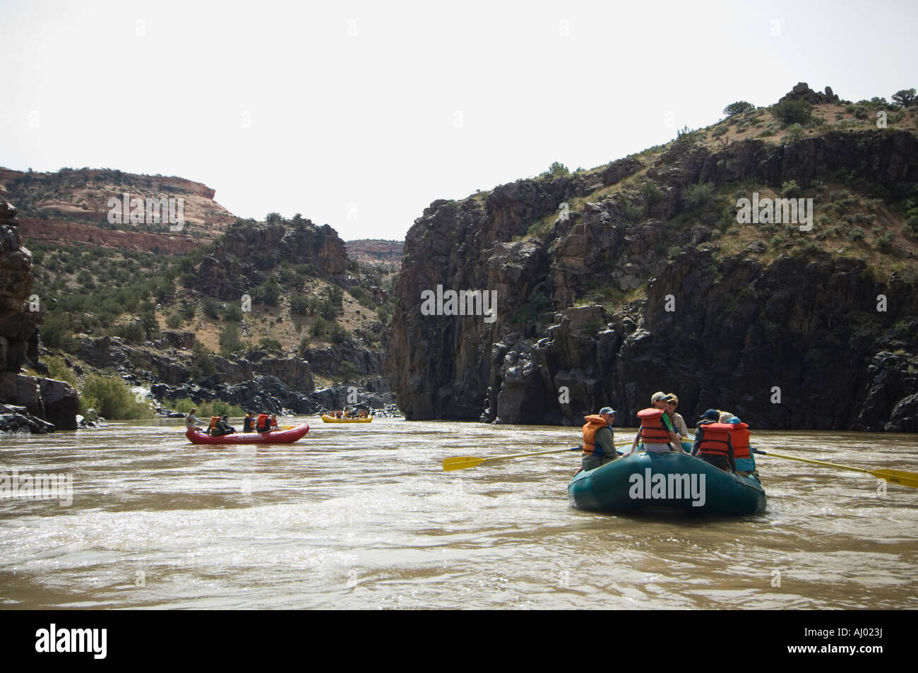 Groups of people river rafting Stock Photo - Alamy