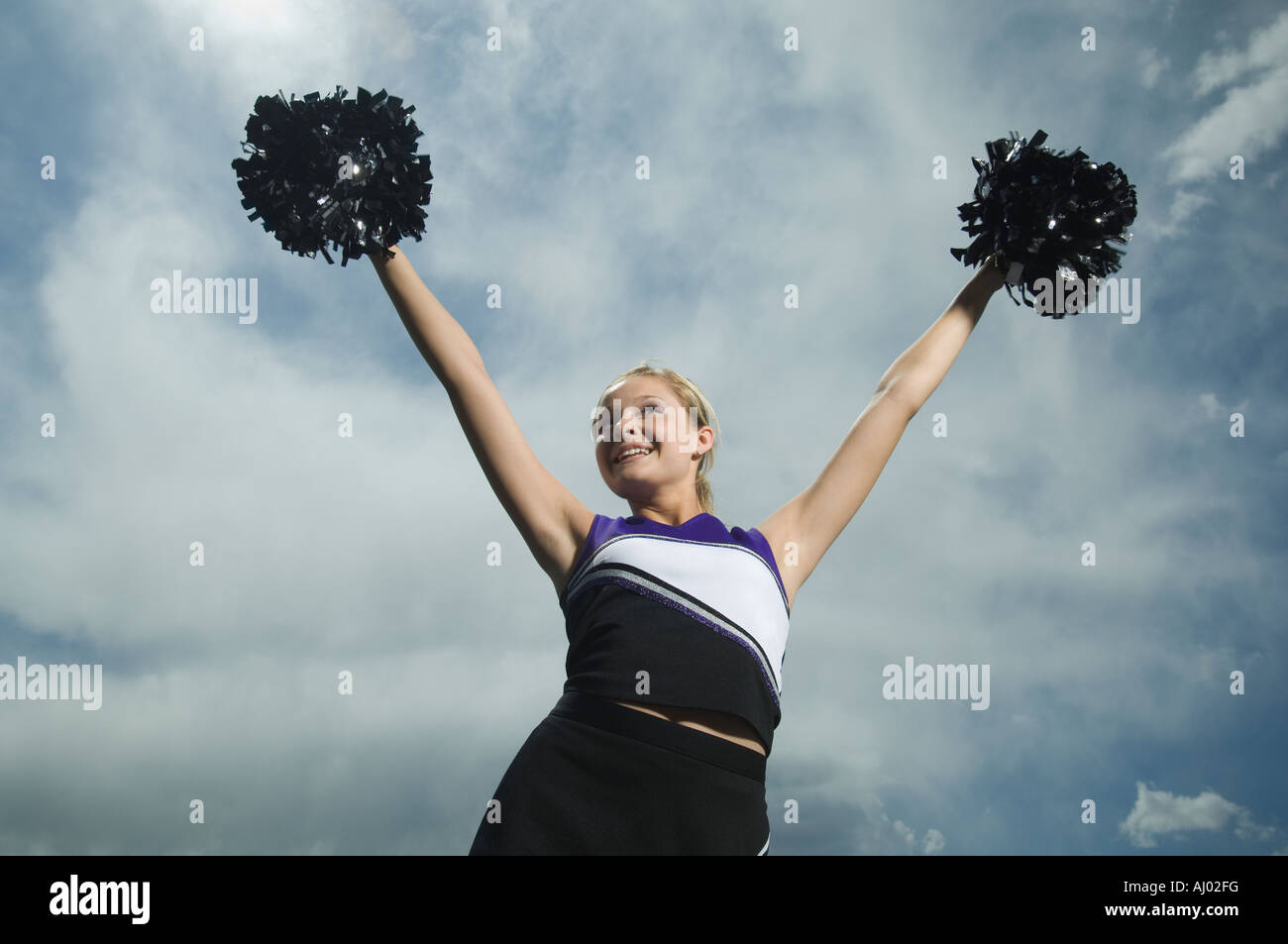 Teen cheerleader uniform smiling hi-res stock photography and images ...