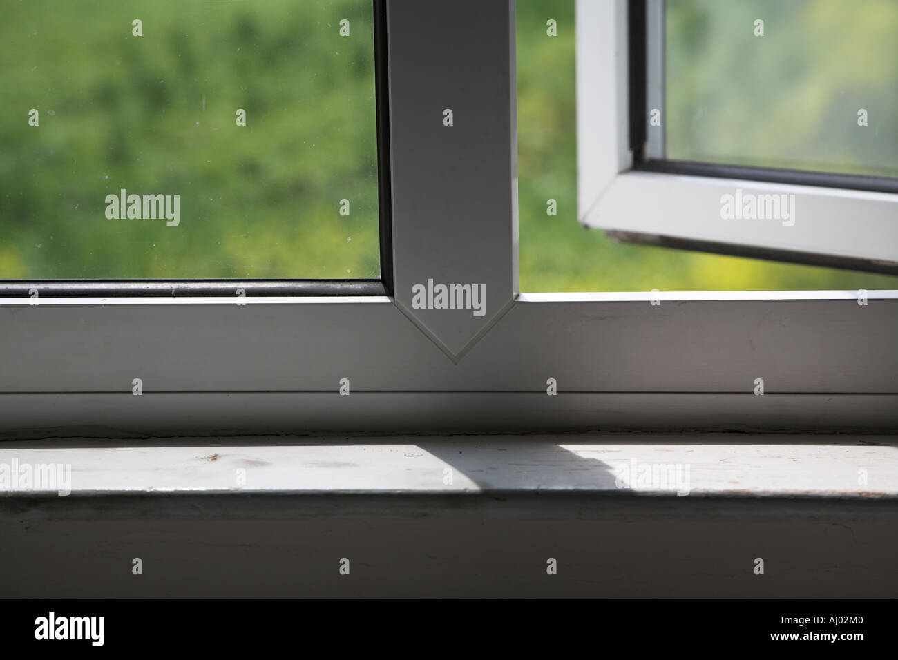 Modern open double glazed window Stock Photo - Alamy