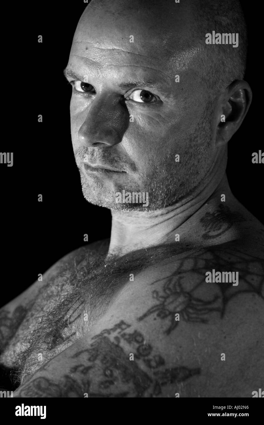 "Ex Royal engineer Mark proudly shows off his collection of tattoos ...