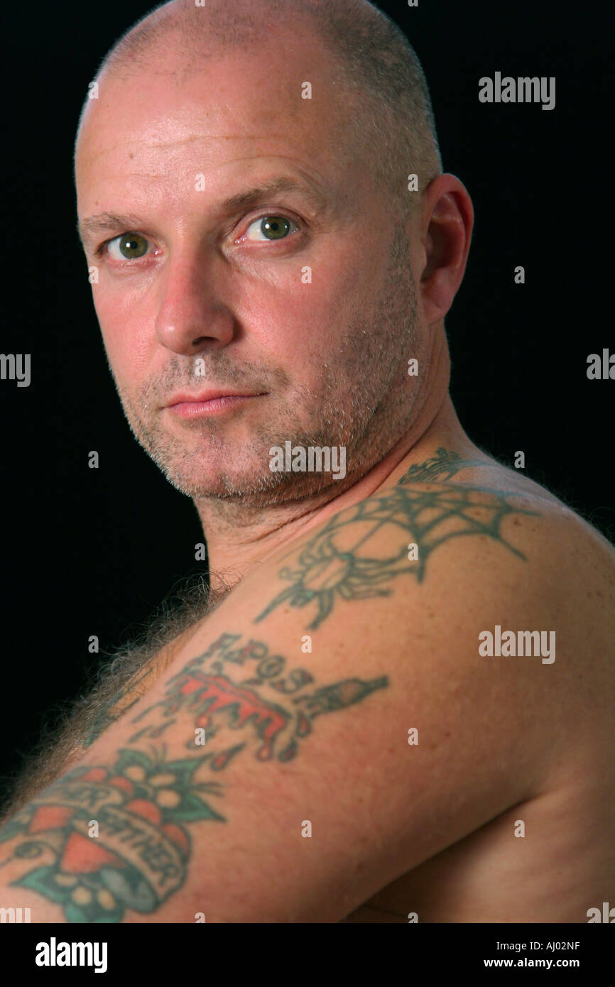 "Ex Royal engineer Mark proudly shows off his collection of tattoos ...