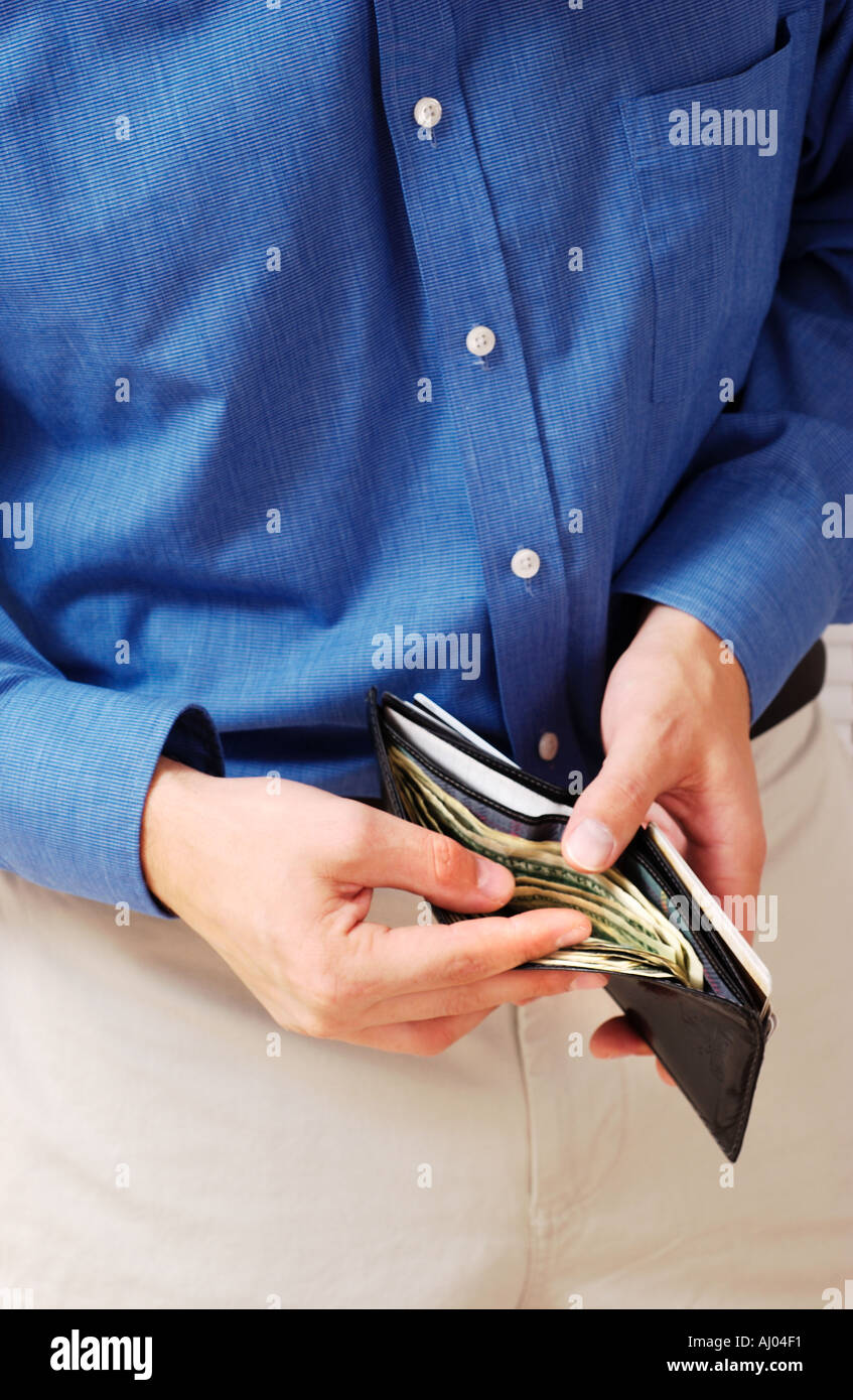 Man Opening Wallet Stock Photo - Alamy