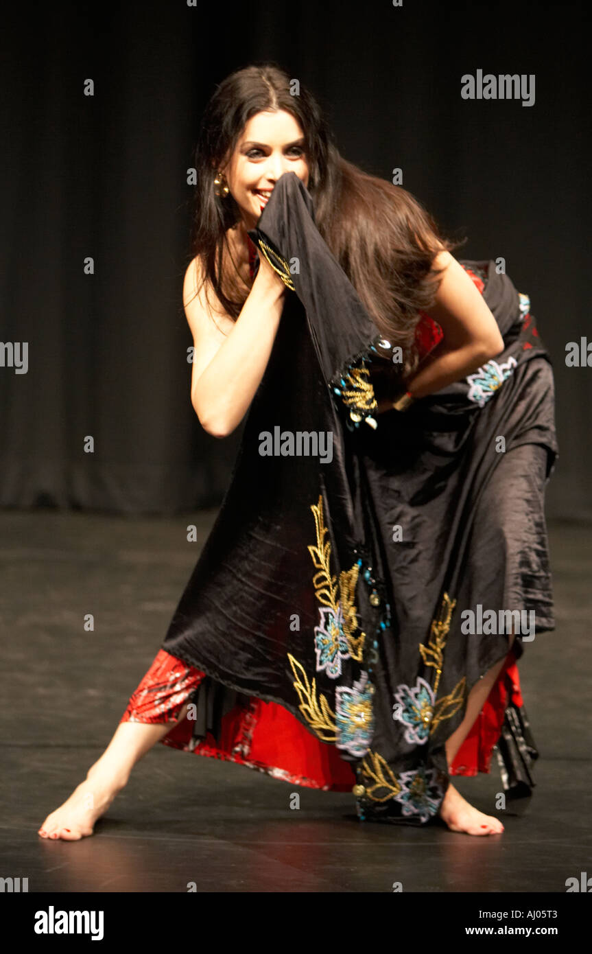 Egyptian belly dancer leila dancing on stage. smiling and laughing ...