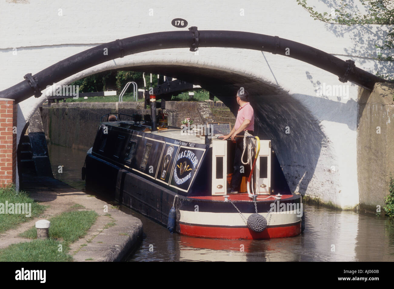 A narrowboat at bridge 176 by Springwell Lock near Harefield on the ...
