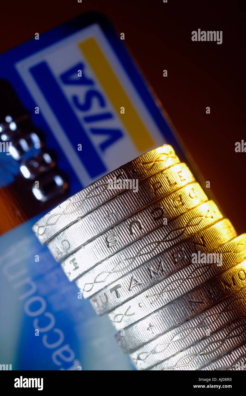 Generic of British pound coins and Visa credit card Stock Photo - Alamy