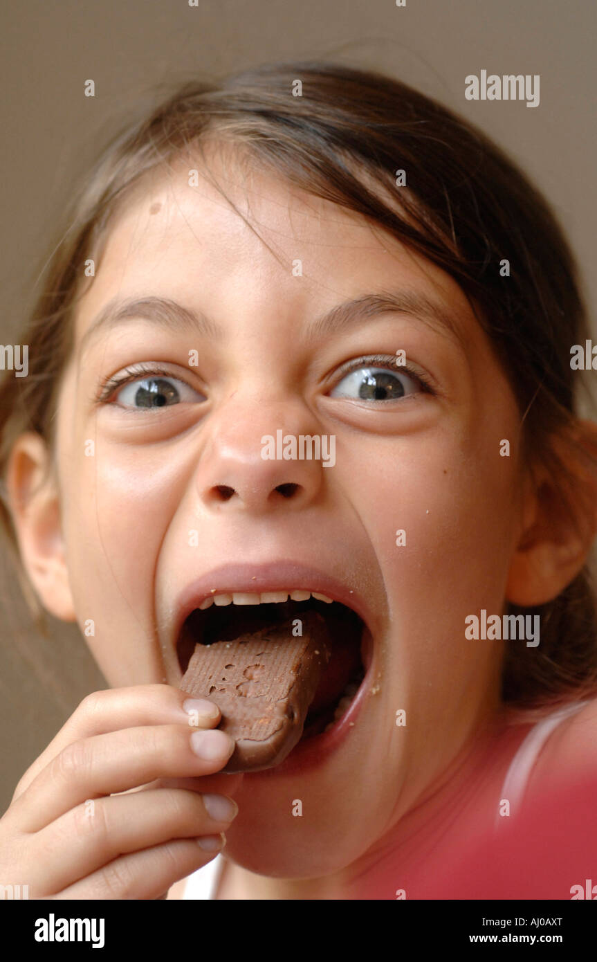Eating chocolate bar uk hi-res stock photography and images - Alamy