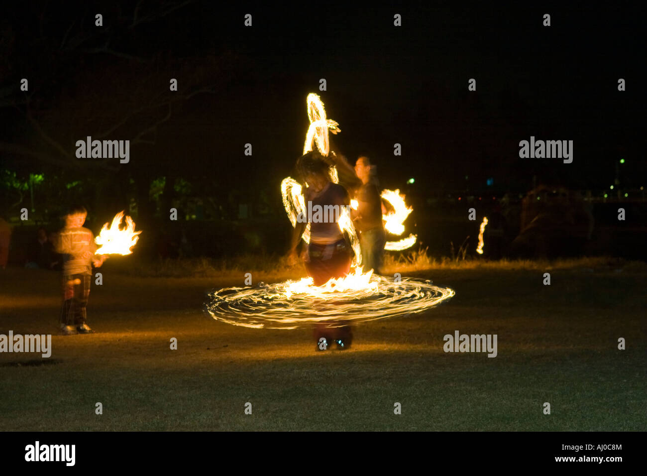 Fire twirler hi-res stock photography and images - Alamy