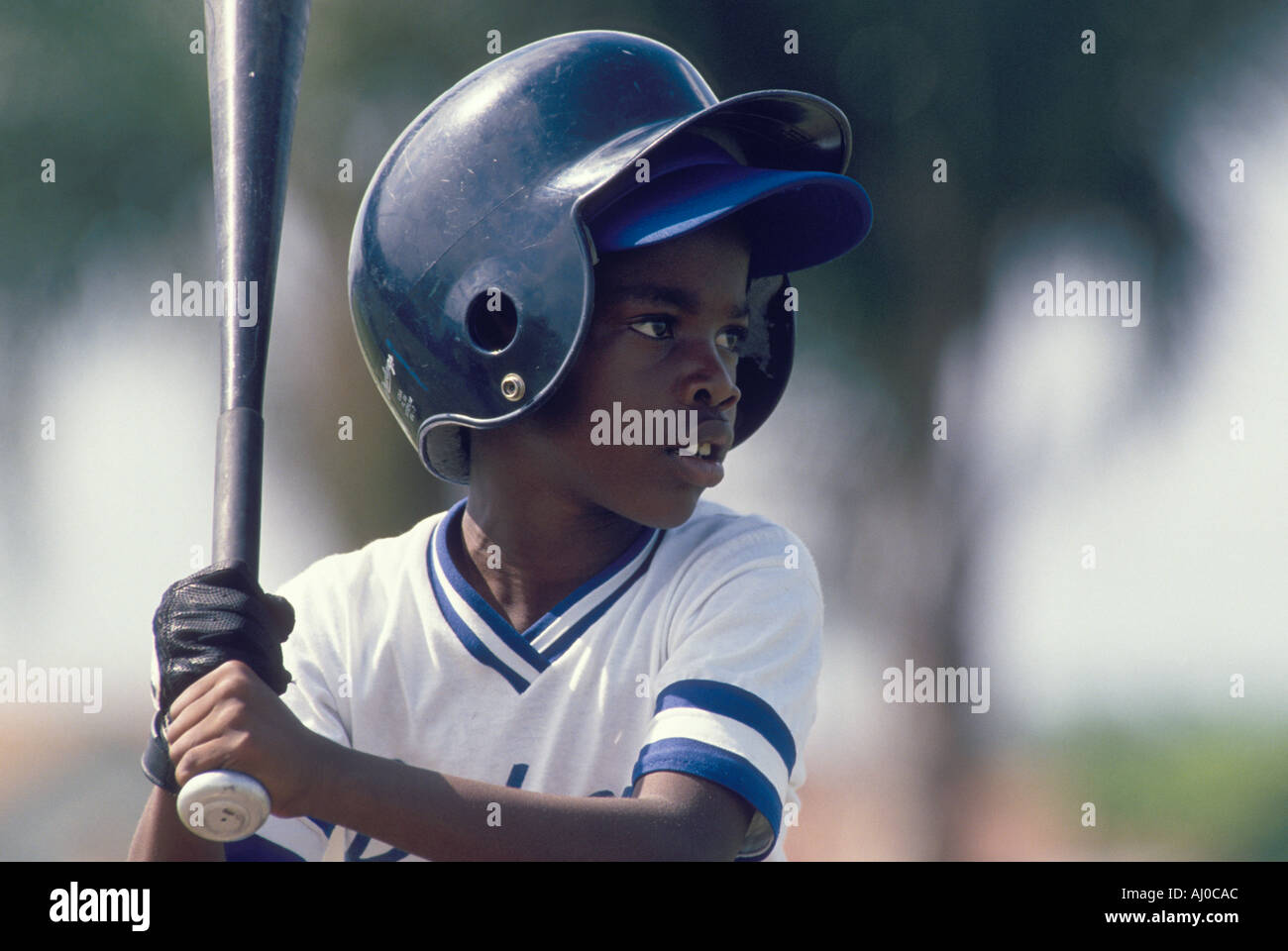 African american child baseball bat hi-res stock photography and images ...