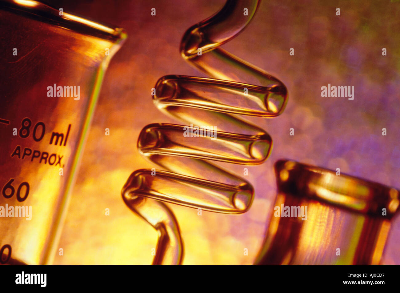 Close up of laboratory glasswork including a beaker a test tube and ...