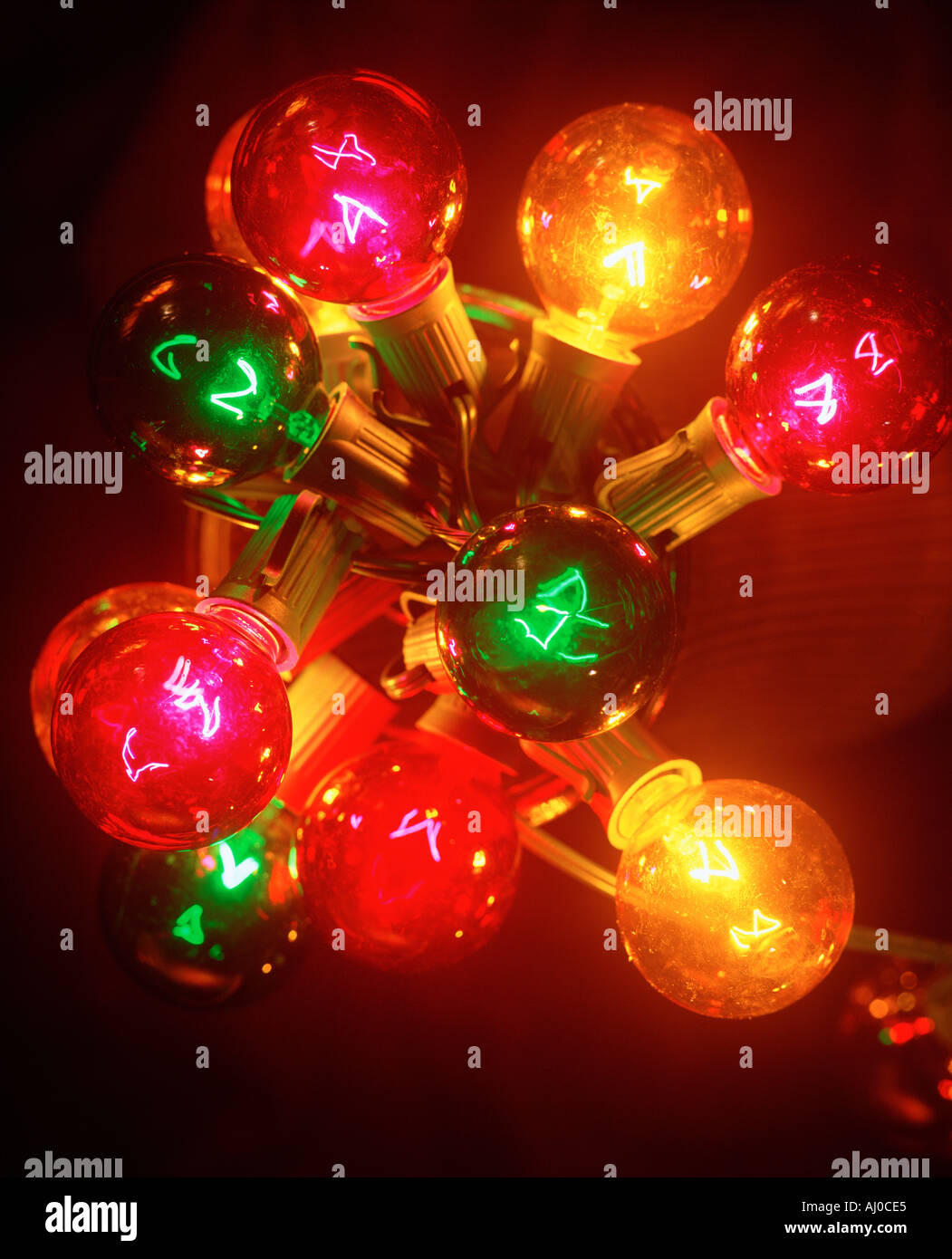 A string of illuminated holiday lights bunched together The clear ...