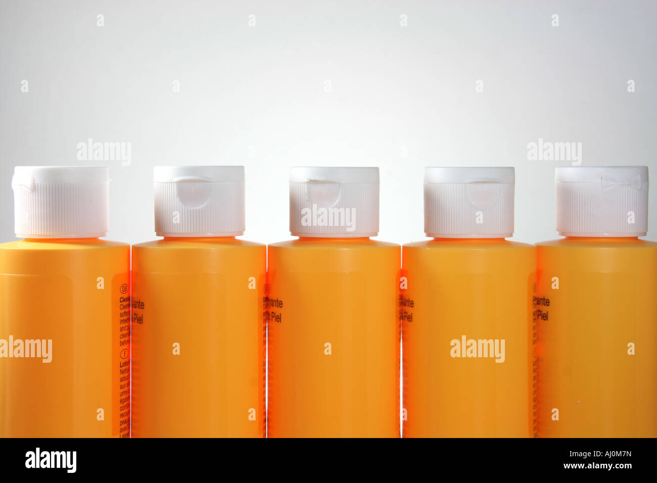 yellow plastic bottles packaging concepts Stock Photo - Alamy