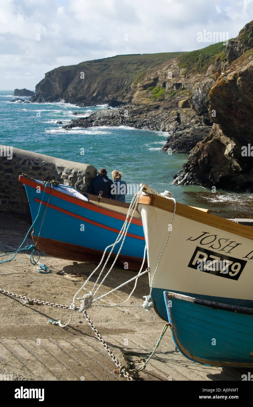 Dinghies on a concrete launching ramp Stock Photo - Alamy