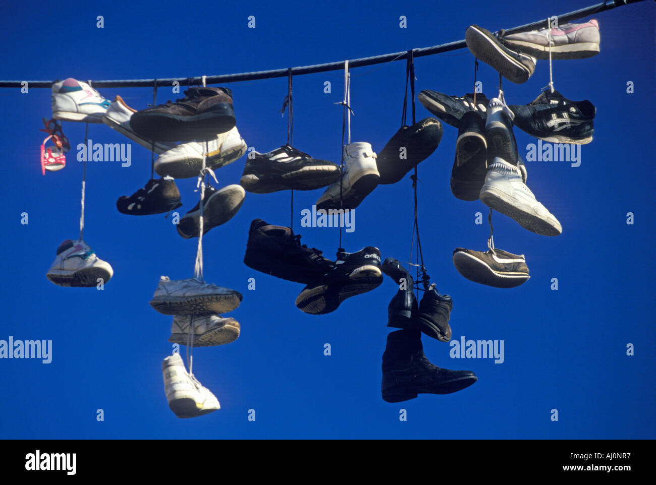 Shoes sneakers hanging wire hi-res stock photography and images - Alamy