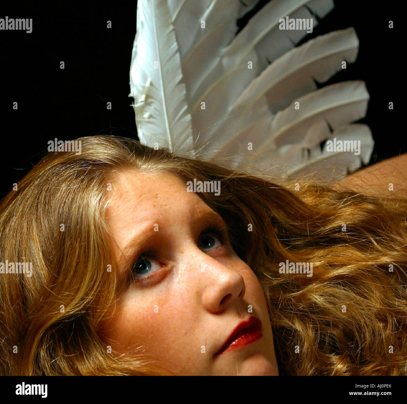 Pouting Angel Female Angel Head shot Stock Photo - Alamy