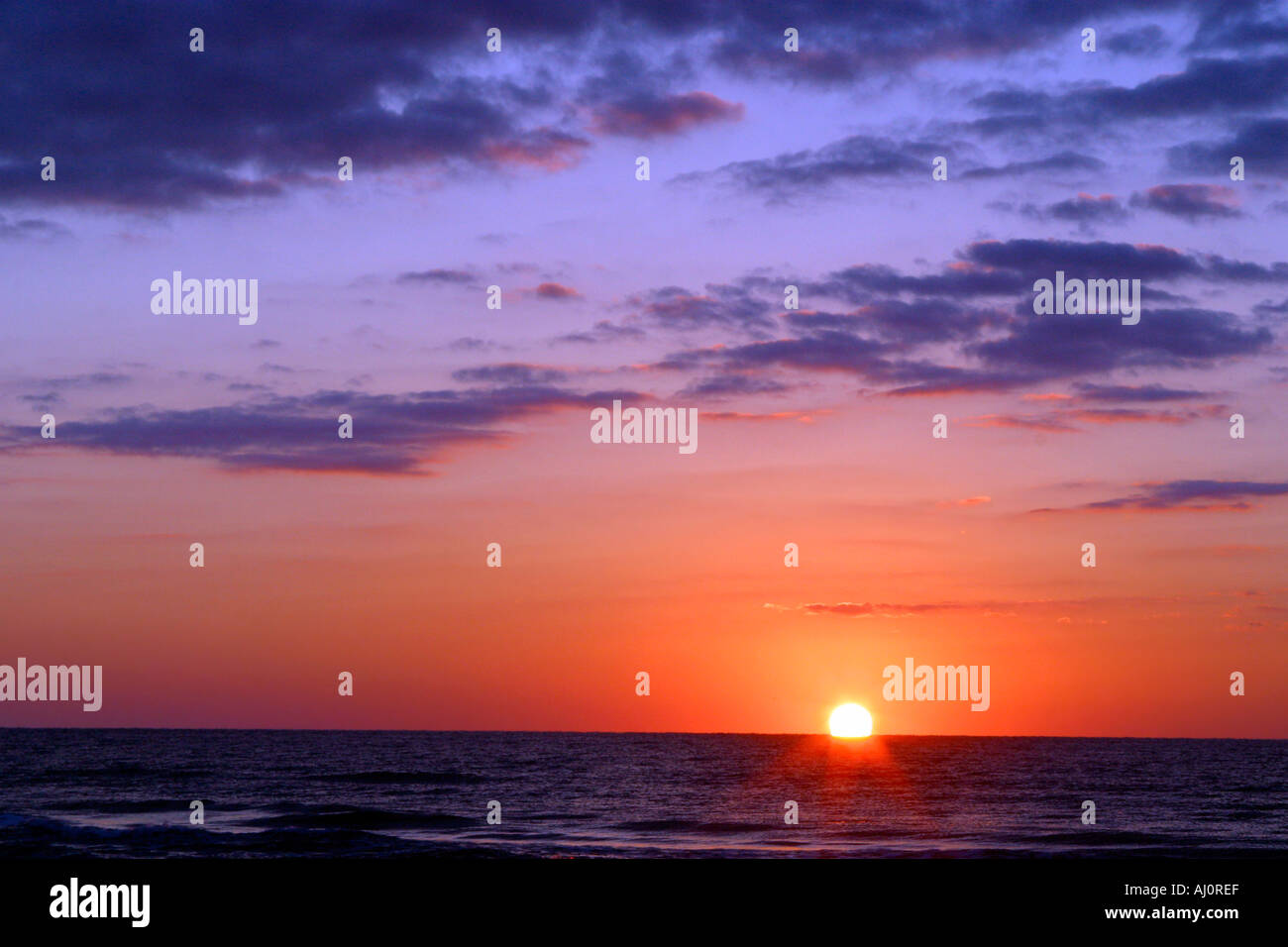 Beach sunset ocean waves texas hi-res stock photography and images - Alamy