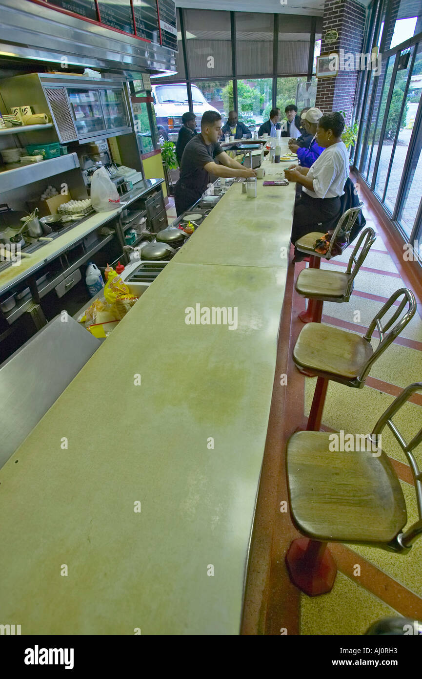 People eating breakfast at diner counter at old Waffle Shop in ...